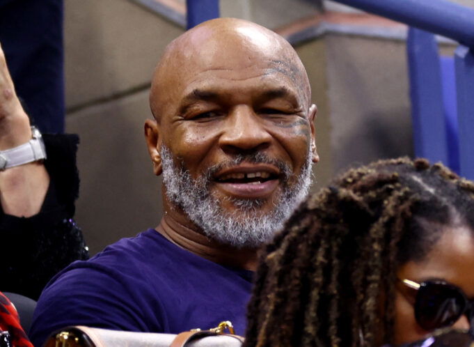 Why did Mike Tyson go to prison? What, when out of & after?
